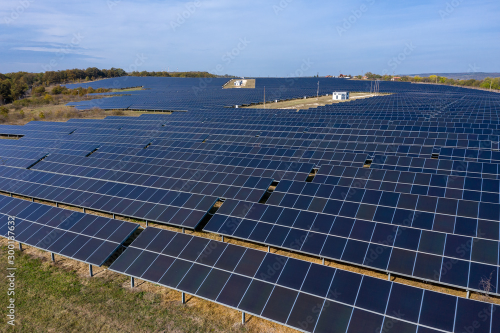 Aerial view of industrial photostatic solar units panels. Photovoltaic ...