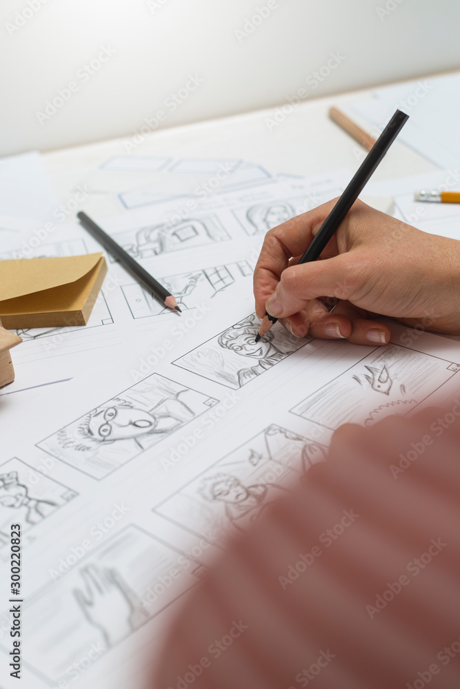 Hands draw a storyboard for the film. Stock Photo | Adobe Stock