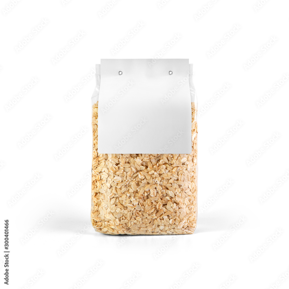 Oat flakes in transparent plastic bag with label isolated on white ...