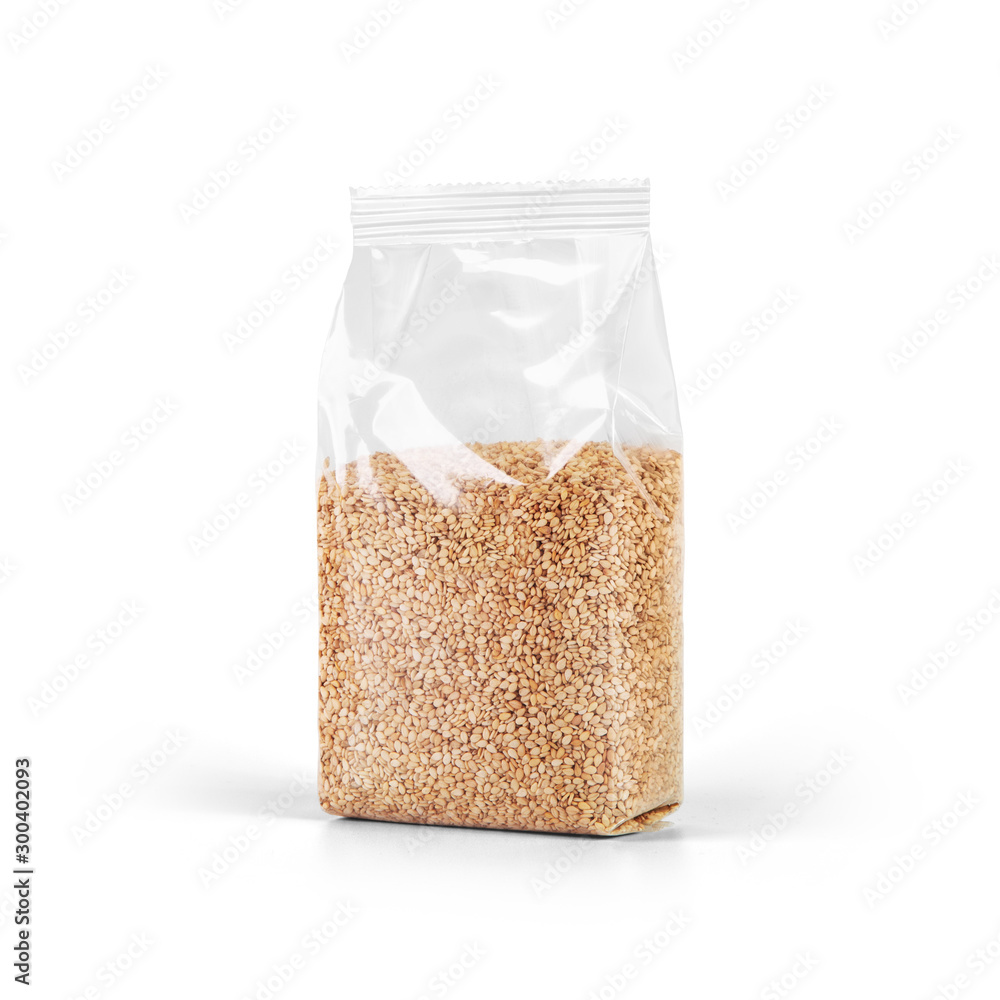 Sesame seeds in transparent plastic bag isolated on white background ...