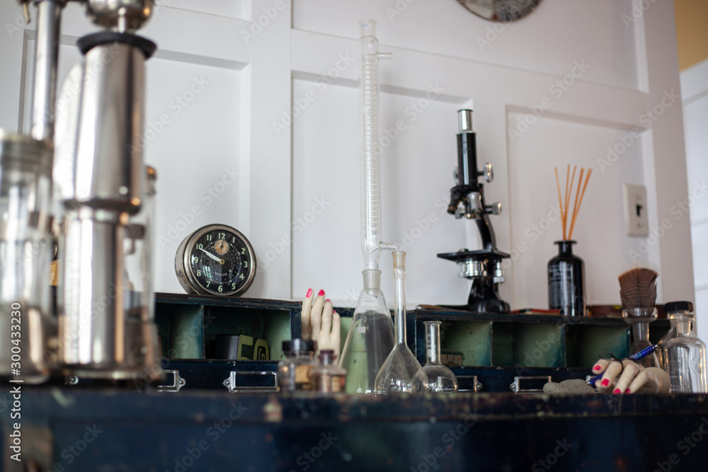 Vintage old things on the table. Glass flasks and test tubes, retro ...