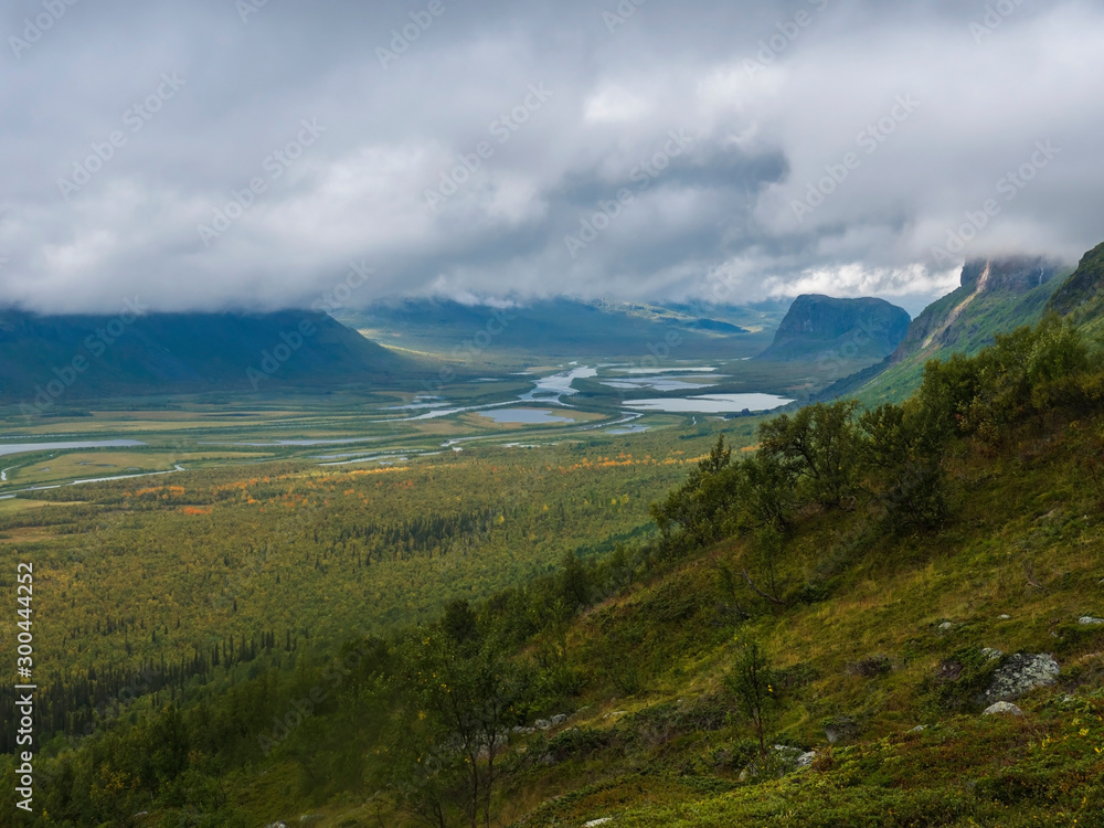 Foto de Stock View on meandering river delta at Rapadalen valley in ...