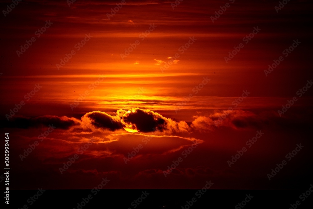 The sun setting in the sky creating the perfect evening view Stock ...