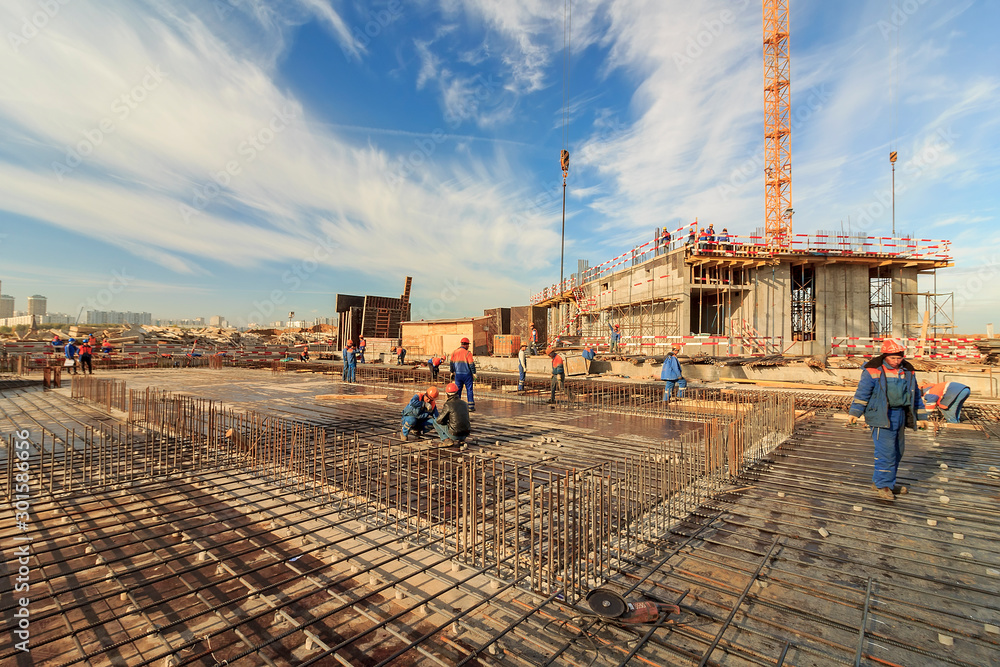 Photo Stock Bar bender fixing steel reinforcement for house concrete floor slab. construction ...