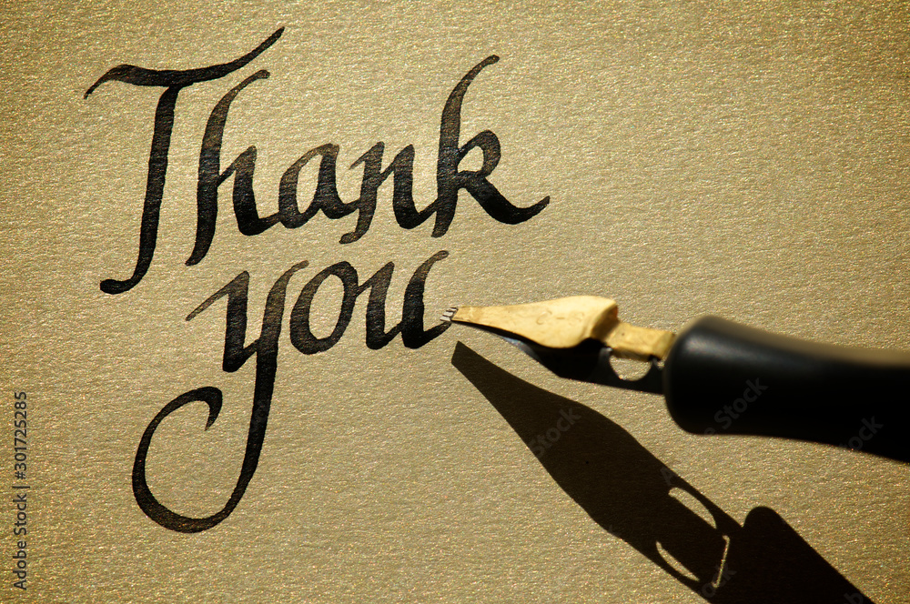 Thank you message handwritten in fresh black ink with old-fashioned ...