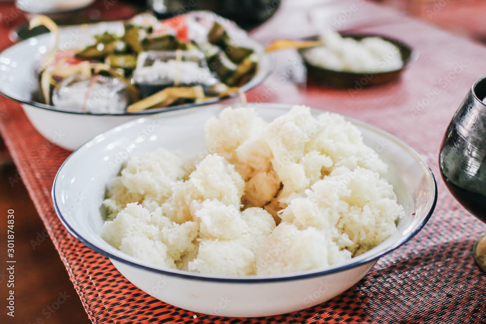 Offer food to monk. Hand while put food offerings in a Buddhist monk's ...