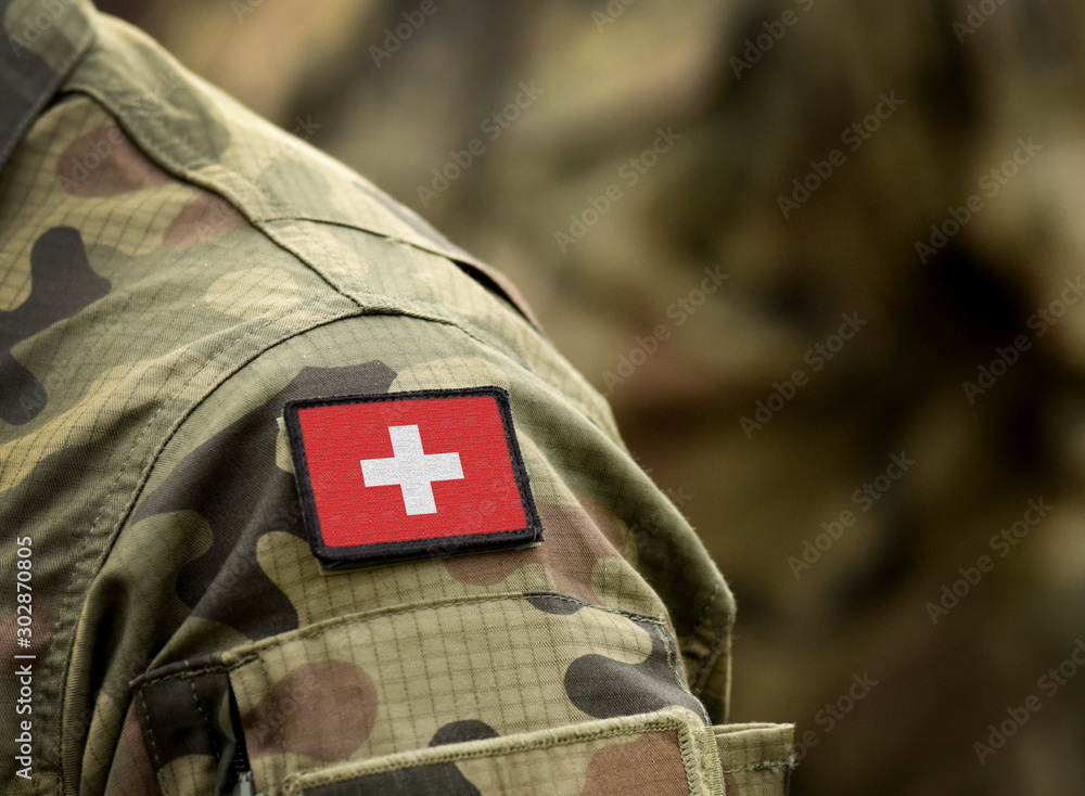 Flag of Switzerland on military uniform. Swiss flag on soldiers arm ...