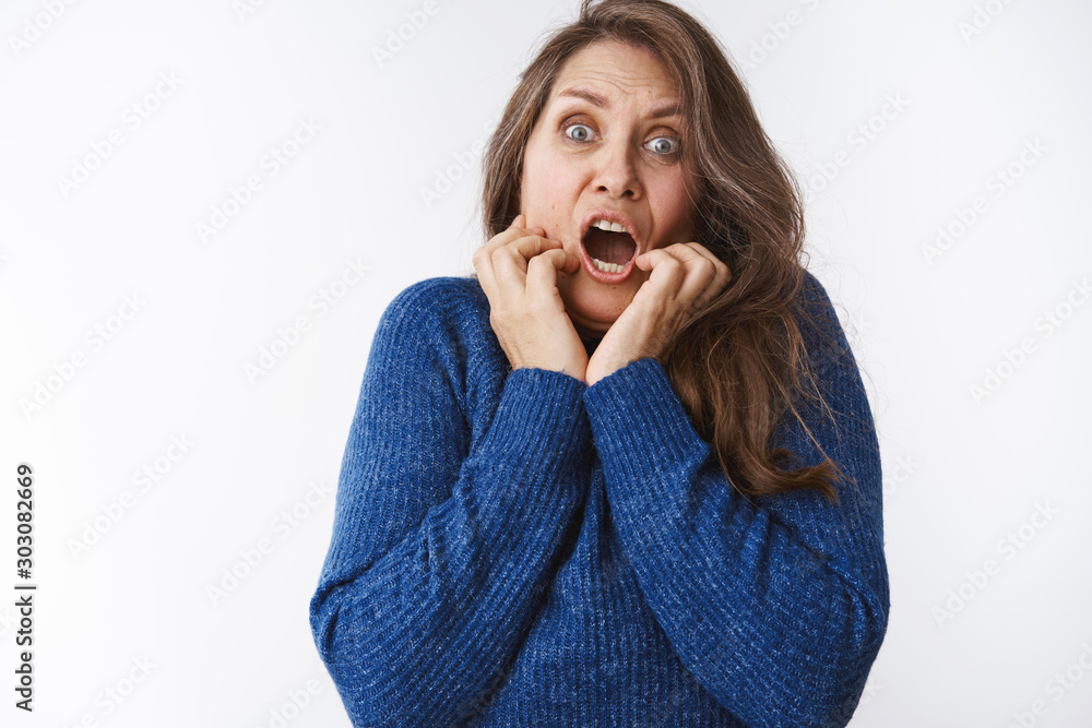 Stock-Foto „Woman stunned from fright standing scared with terrified ...