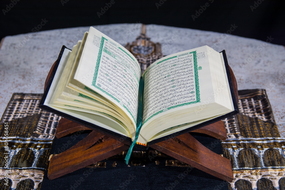 Muslims Islamic Holy Book Quran Majid with Quran wooden stand and ...