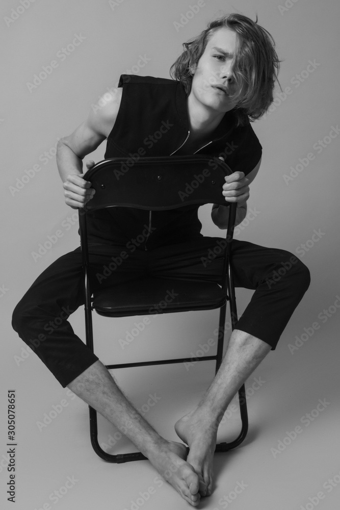 Muscle strong beautiful stripped male model portrait on isolated font ...