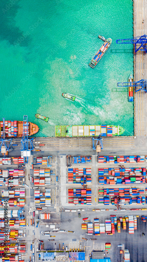 Top view of Deep water port with cargo ship and containers. It is an ...