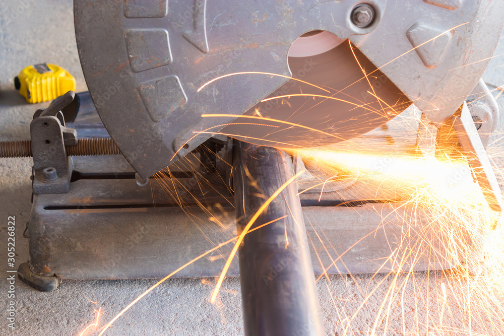 Cutting steel with a cutter causes sparks which are dangerous. Stock ...
