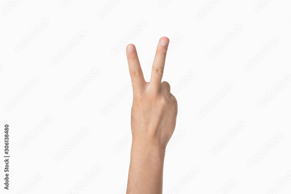 hand gesture which means two, index finger and middle finger pointing ...