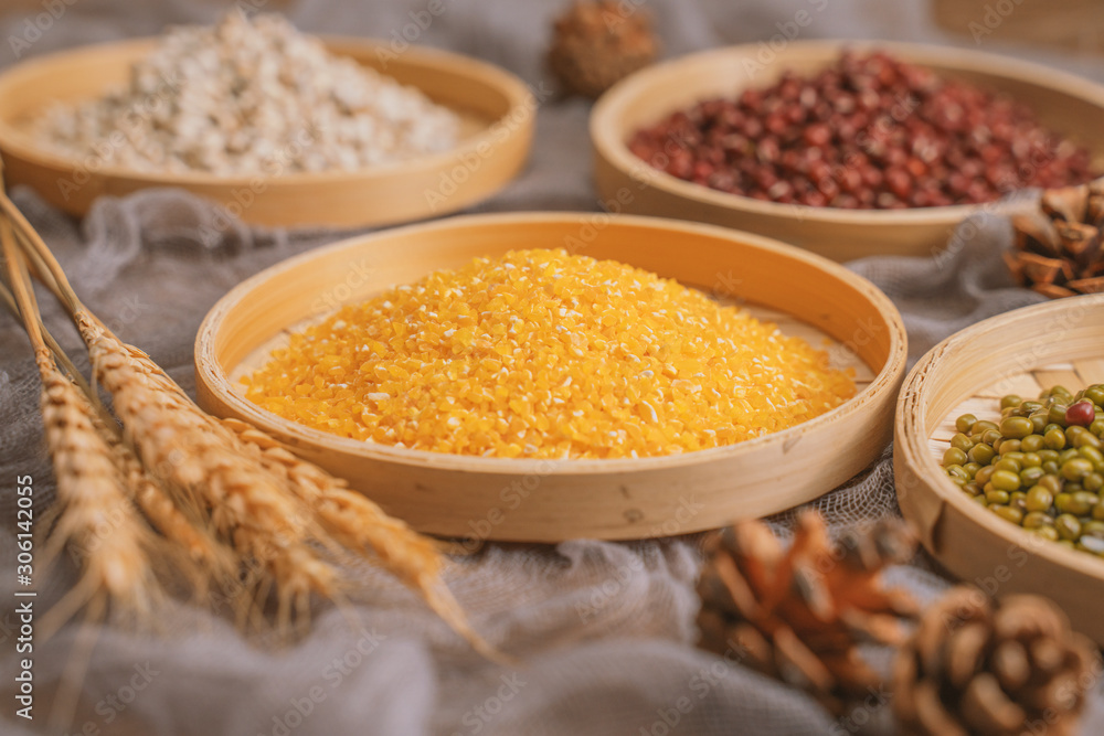Chinese traditional grains in chinese steamer on wooden table. Made of ...