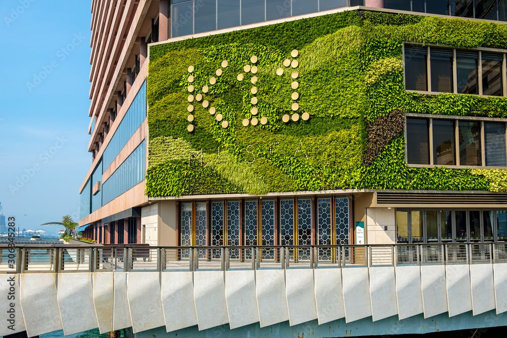 A bronze sculpture of McDull, an anthropomorphic pig cartoon character ...