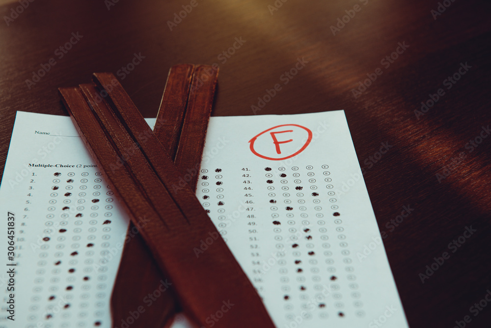 Bad school report card. "F" mark in test. Domestic spanking and ...