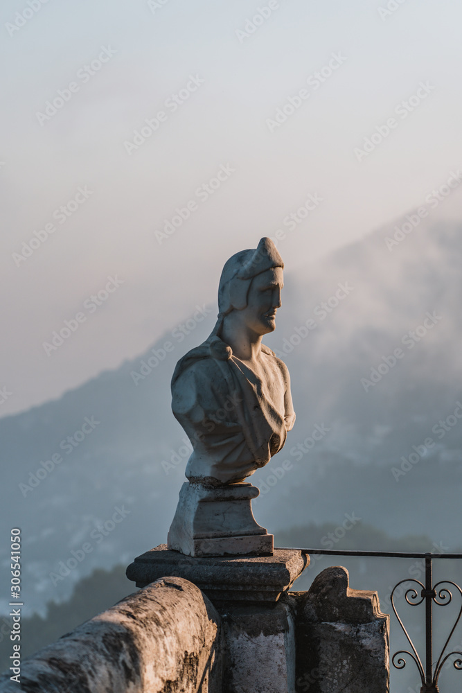 Historic statue in sunset at terrace of infinity, Villa Cimbrone, in ...
