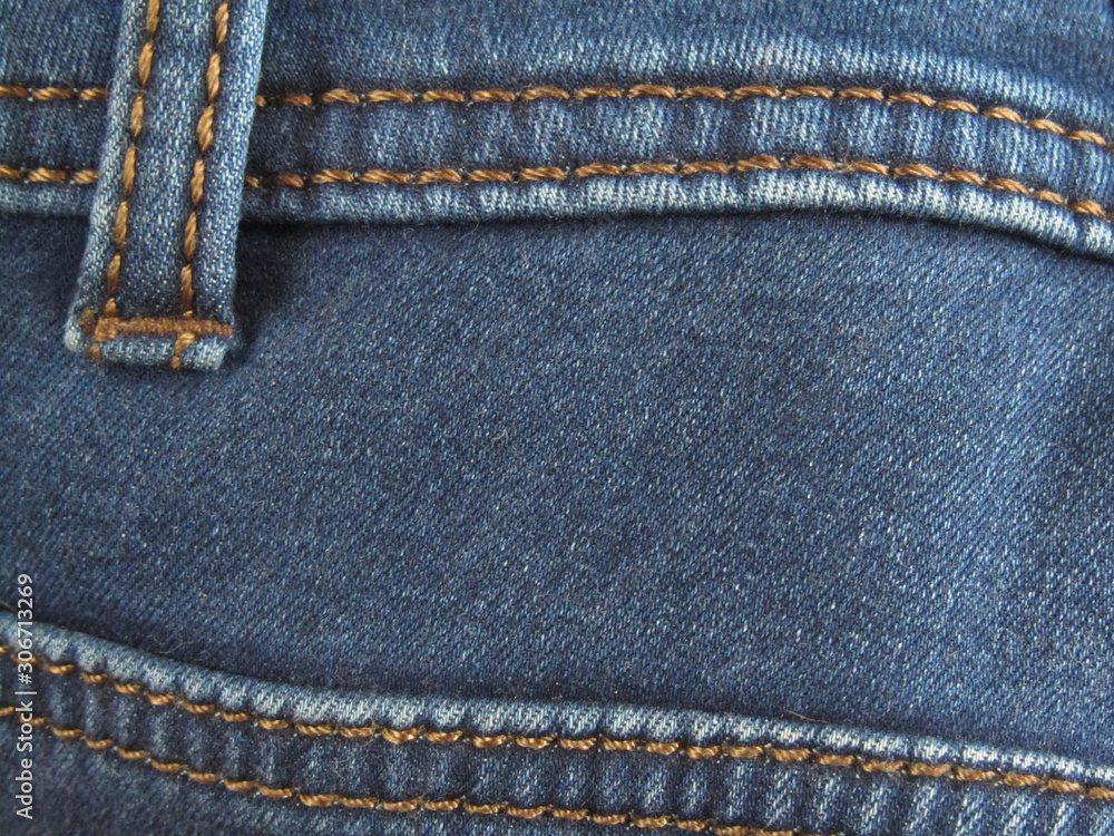 Blue jeans background with double stitching. Close-up. Copy space ...