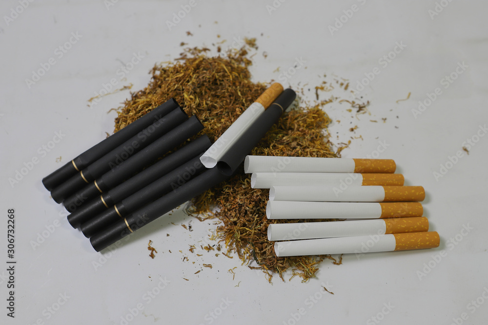 cigarette filters Empty cigarette paper top view Several black and ...