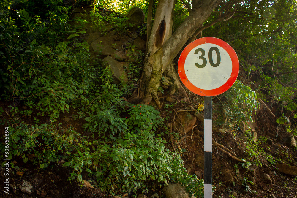 Indian road sign indicating speed limit in the ghat road of Yercaud ...
