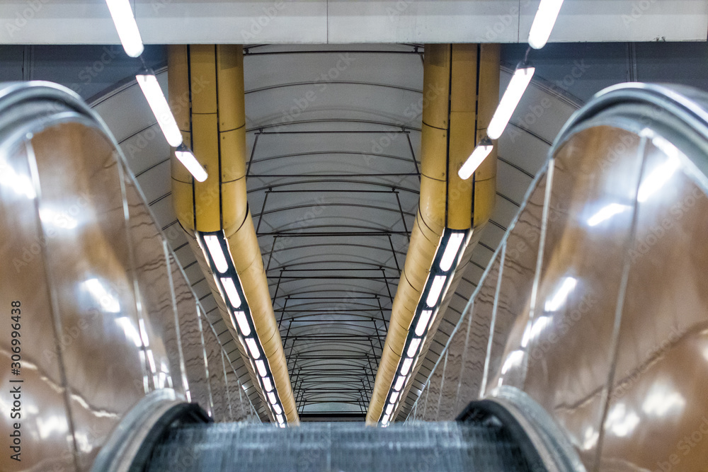 Escalator curve in the metro/underground Mustek station in Prague ...
