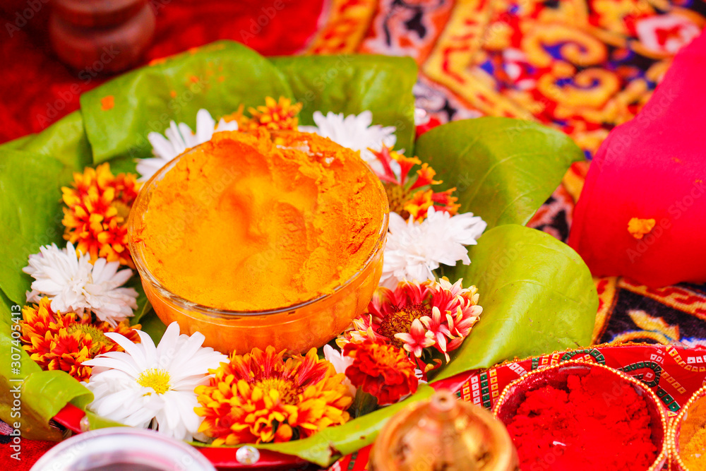 Traditional wedding ceremony in Hinduism: Turmeric in glass bowl for ...