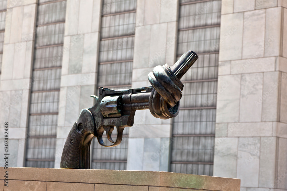 Gun tied in a knot outside UN headquarters as symbol for reaching peace ...