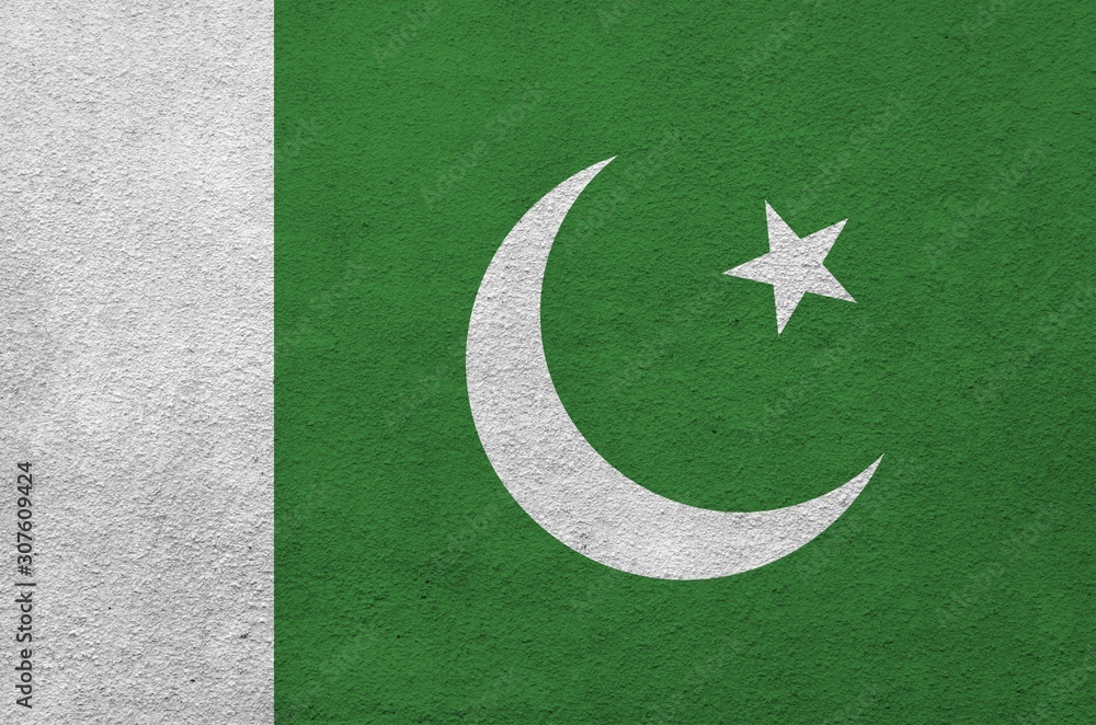 Pakistan flag depicted in bright paint colors on old relief plastering ...