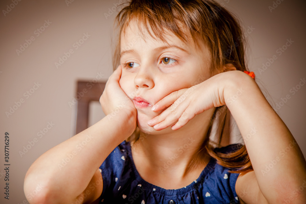 Little cute child girl expressing sadness. Gestures, body language ...