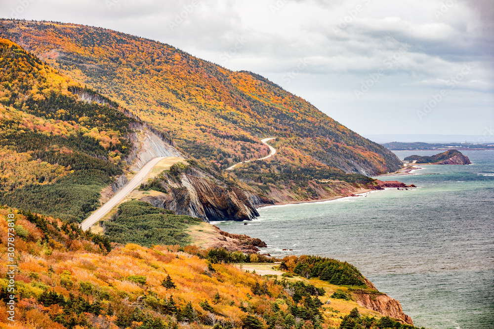 The famous Cabot trail winds through the hills of the Cape Breton ...