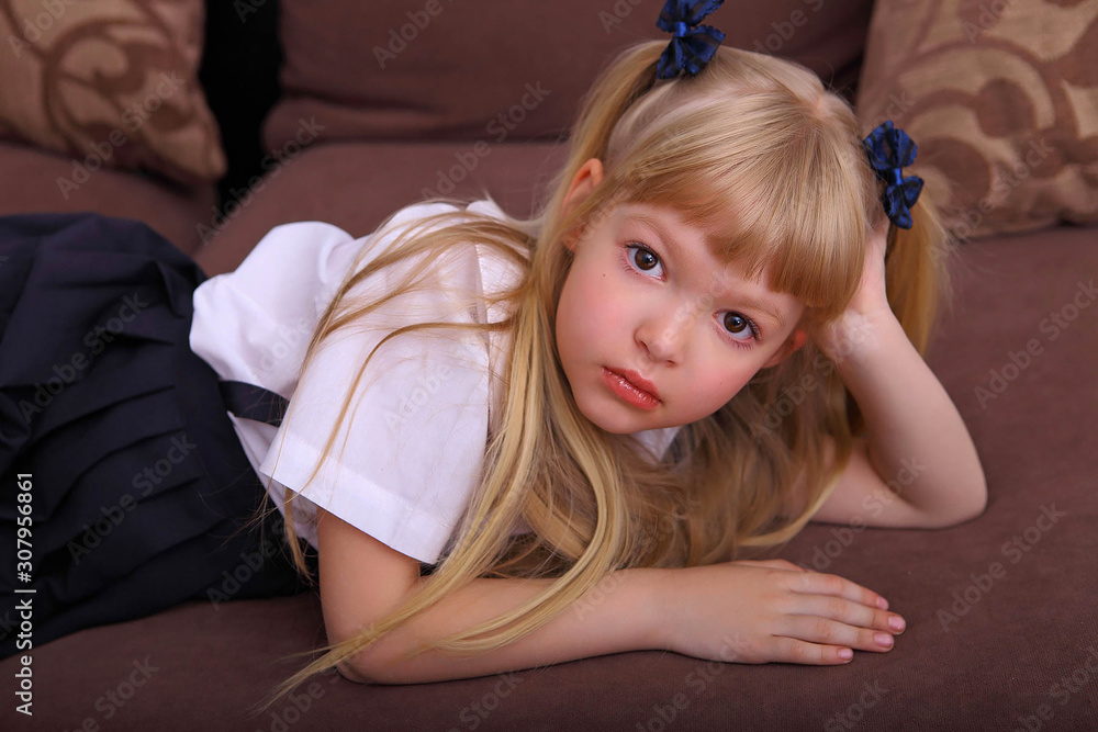 Nice cute sweet tender cheerful positive small little girl with curly ...