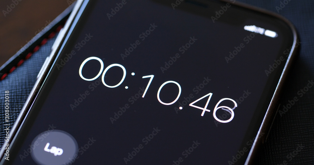 Numerical digital stopwatch with white number and black screen on ...