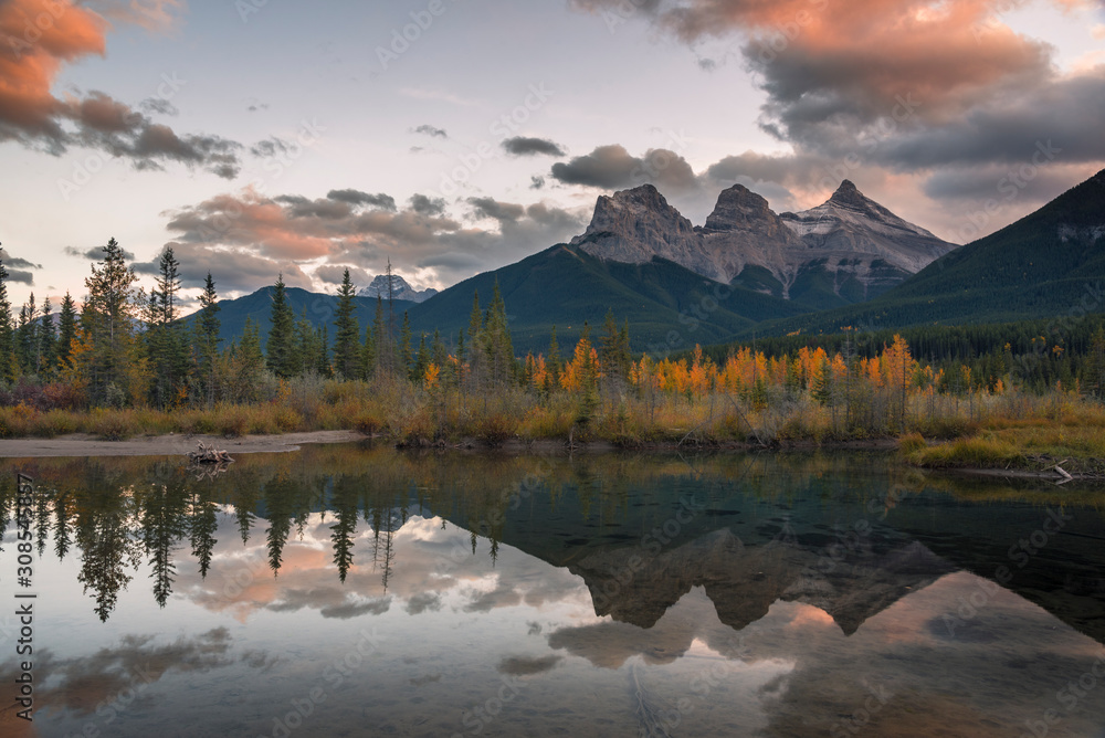 Sunset over Three Sisters in Autumn near Banff National Park, Canmore ...
