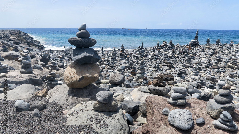 Promenade and pebble towers on the beaches of El Jardín and El Beril ...