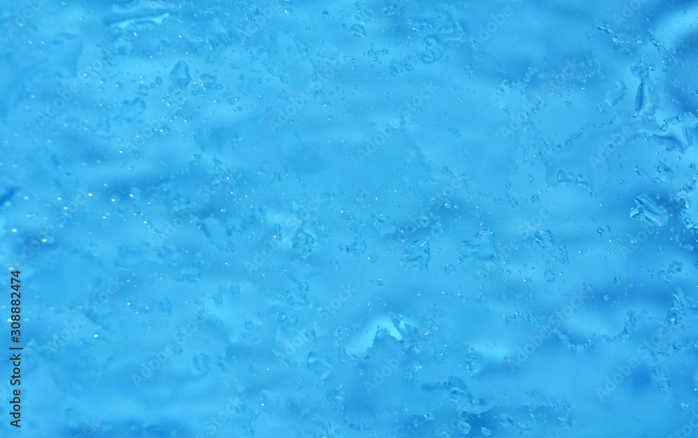 The color watermark of the sky on the glass surface resembling sea ...