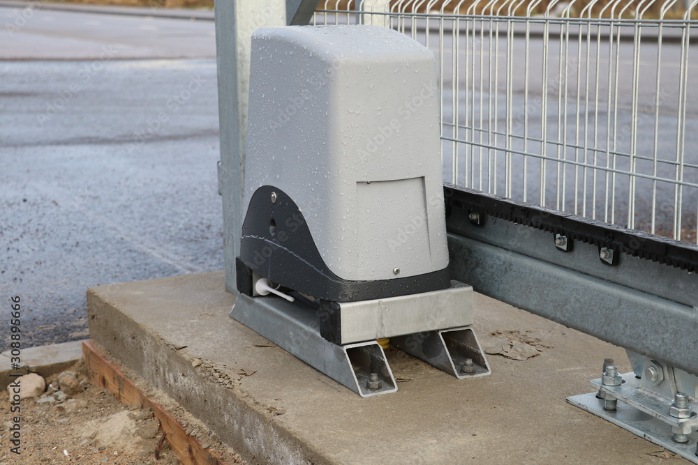 Gate motor. Parts of Sliding Gate system Stock Photo | Adobe Stock
