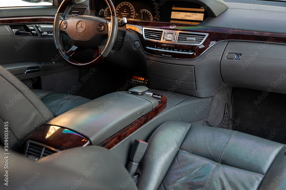 The interior of an expensive business class car inside the front seats ...