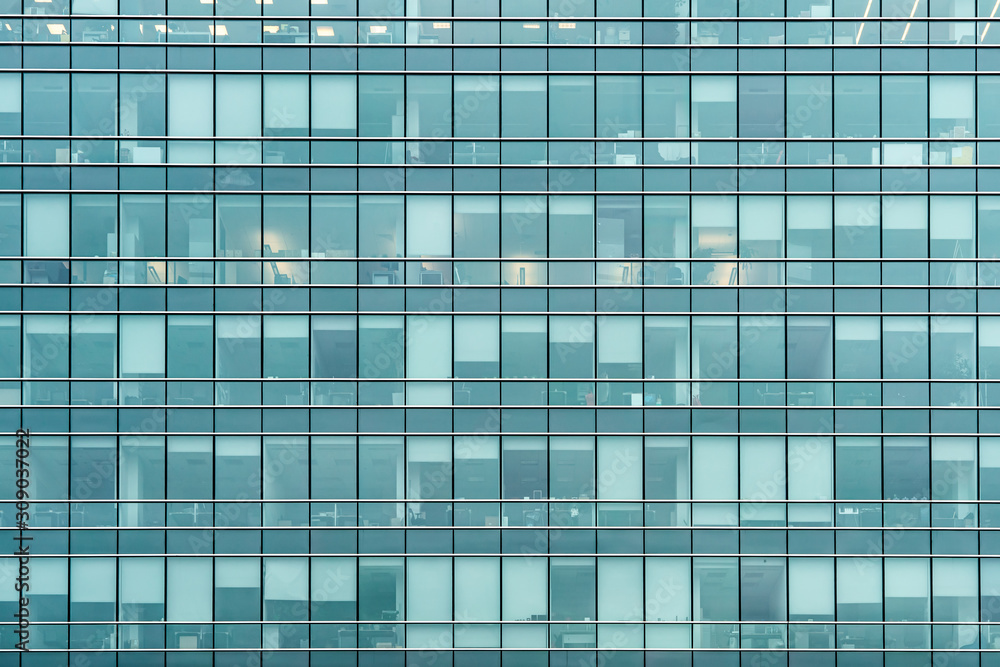 Glass facade texture of a modern office building. High tech architecture. Elements of urban ...