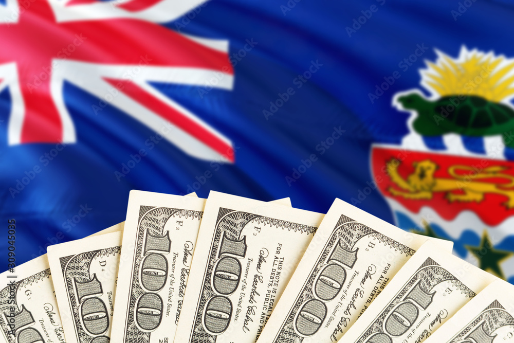 Cayman Islands economy concept. Dollar banknotes on the side of ...