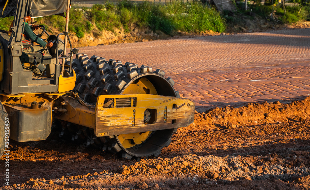 Soil compactor with vibratory padfoot drum. Heavy duty machinery ...