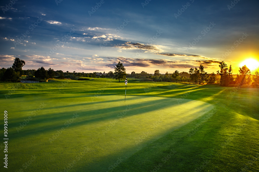 Sunset at the golf course Stock Photo | Adobe Stock