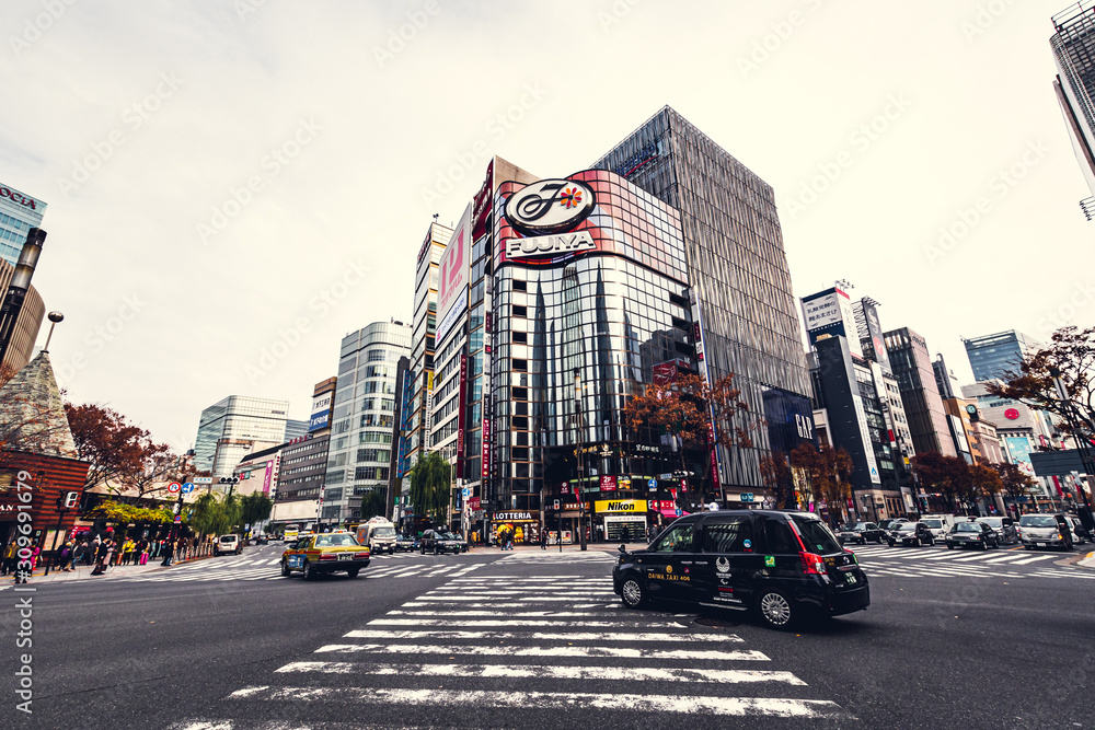 GINZA, TOKYO, JAPAN - December 11, 2019 : Fujiya building. Cityscape at ...