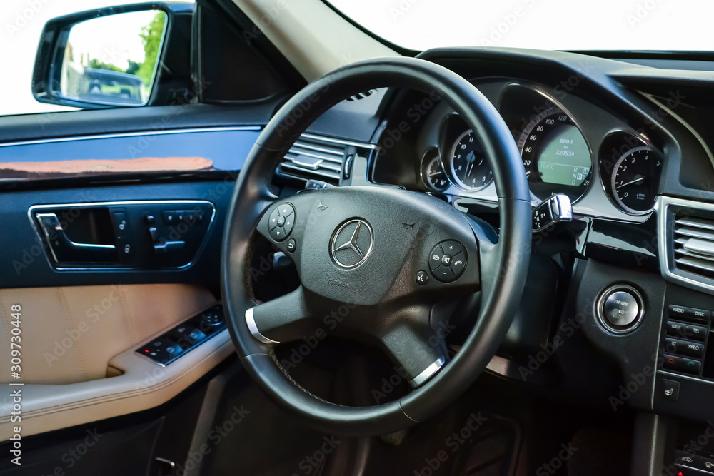 View to the white interior of Mercedes E-Class W212 with dashboard ...