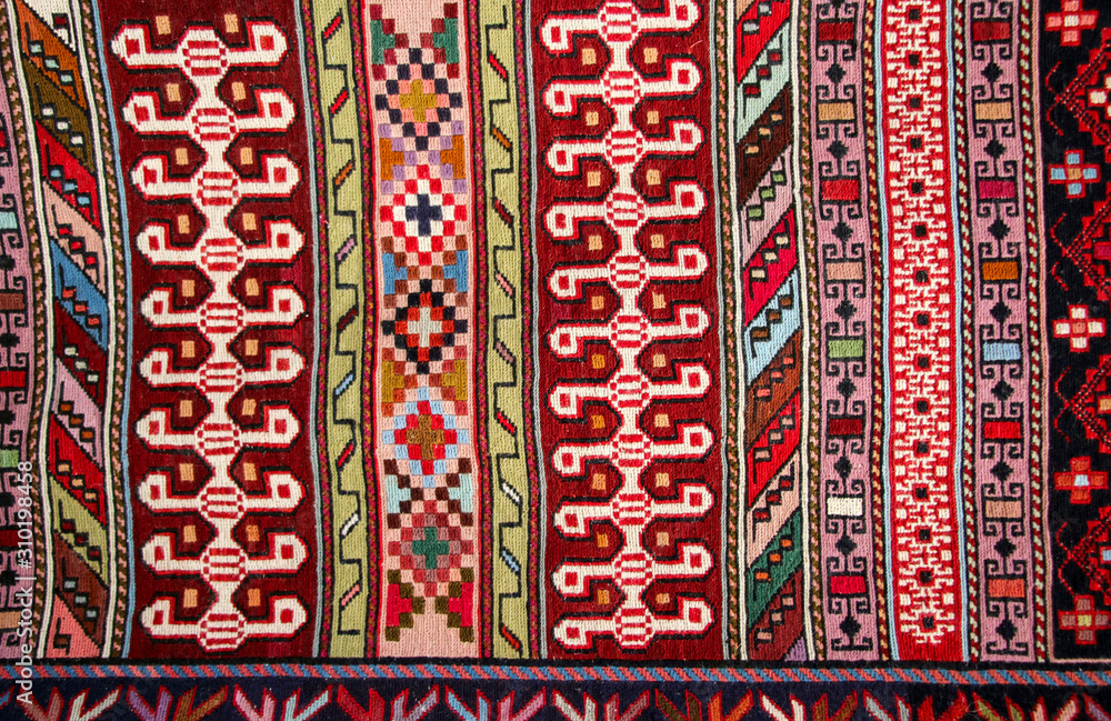Old traditional carpet with a geometric pattern blue, white and dark ...