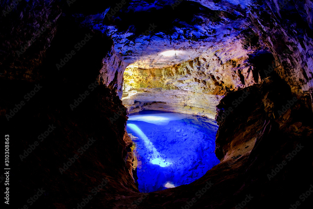 Poco Encantado, blue lagoon with sunrays inside a cavern in the Chapada ...
