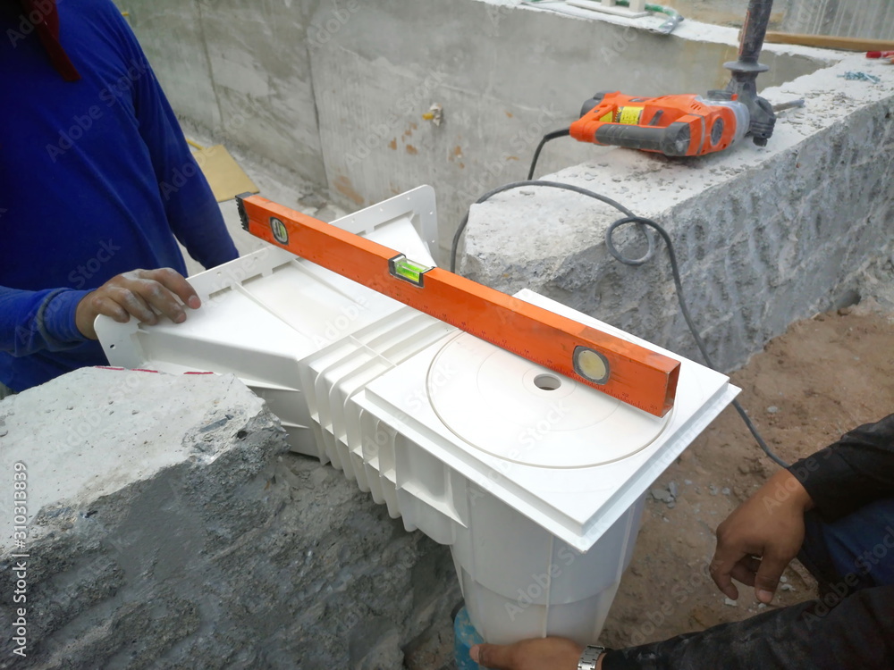 Swimming pool construction.Installing the Skimmer System. Stock Photo ...