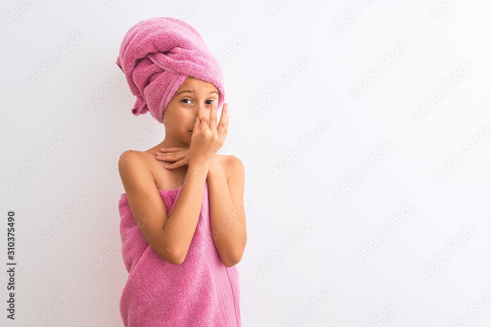 Beautiful child girl wearing shower towel after bath standing over ...