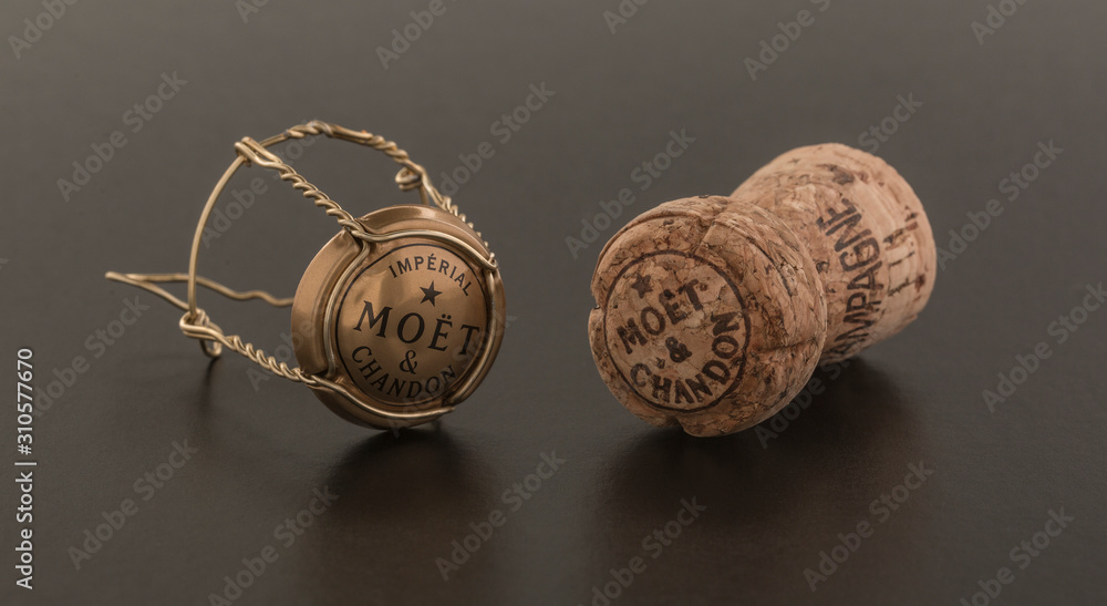Cork and top from Moet and Chandon Brut Imperial champagne on a grey ...