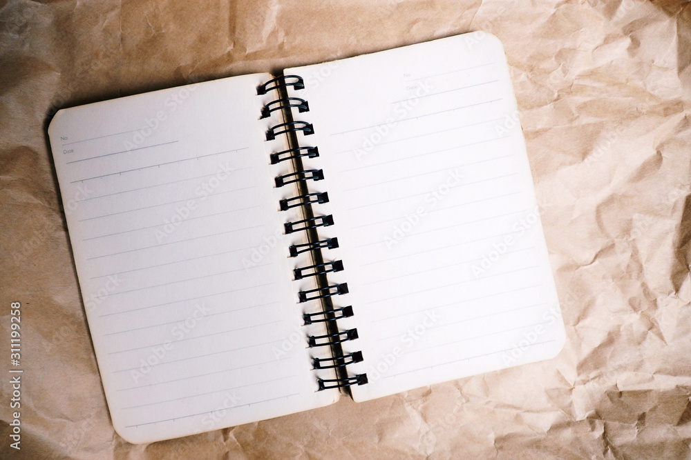 Top view of blank notebook white paper open with copy space for add ...