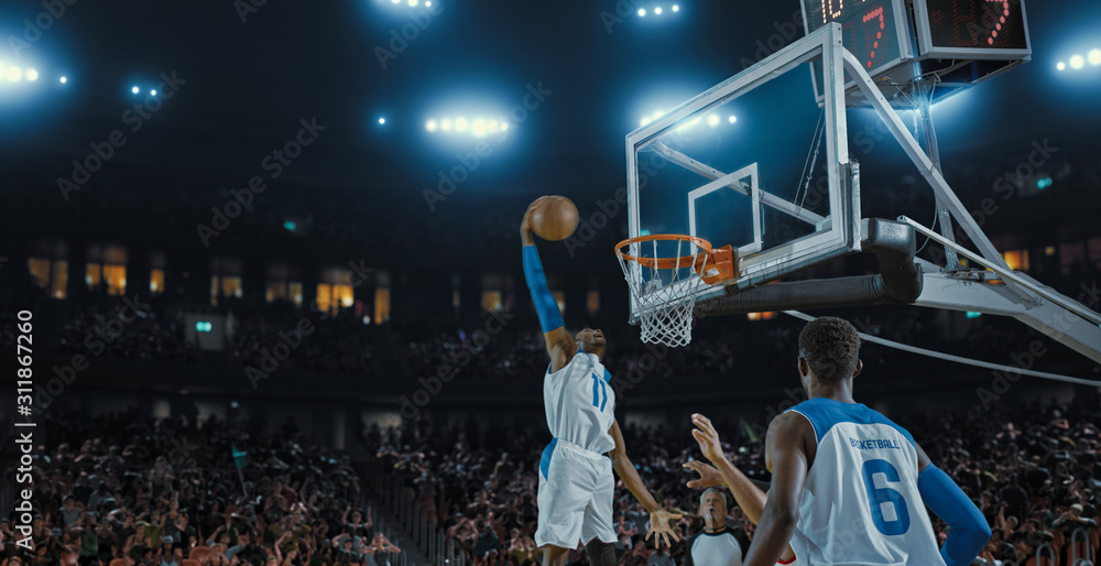 Basketball players on big professional arena during the game. Tense ...
